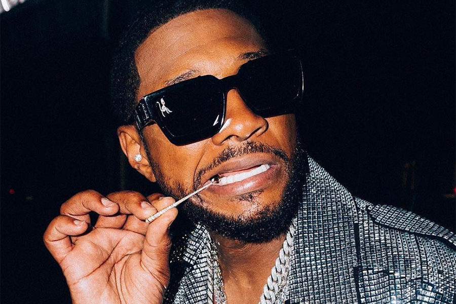 Judge the Jewels: R&B Legend Usher Raymond’s Diamond Toothpick